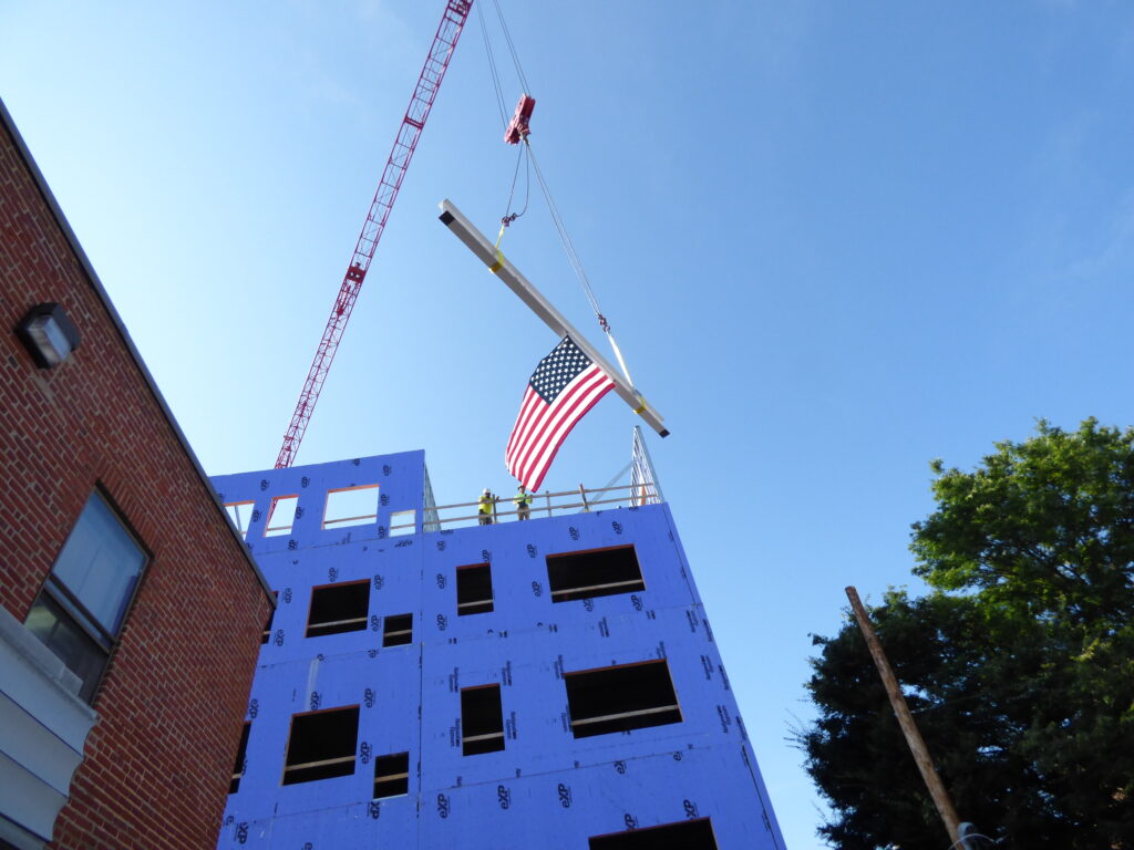 Landis Place on King marks construction milestone with topping-out ...