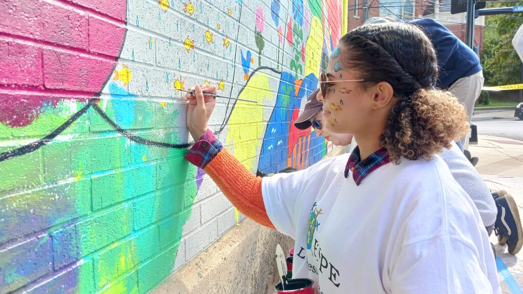Welcoming mural at Ganse Apothecary nears completion - One United Lancaster