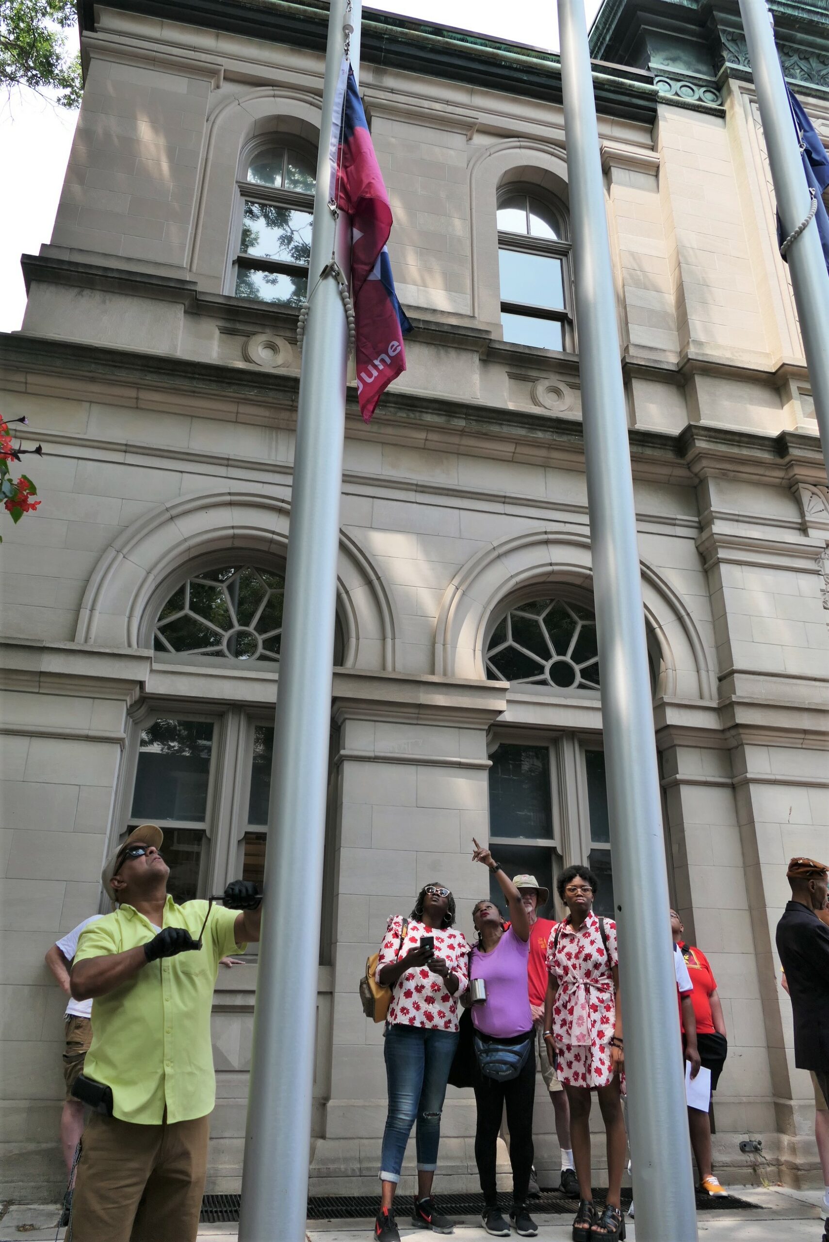 Community commemorates Juneteenth with flag-raising at City Hall ...