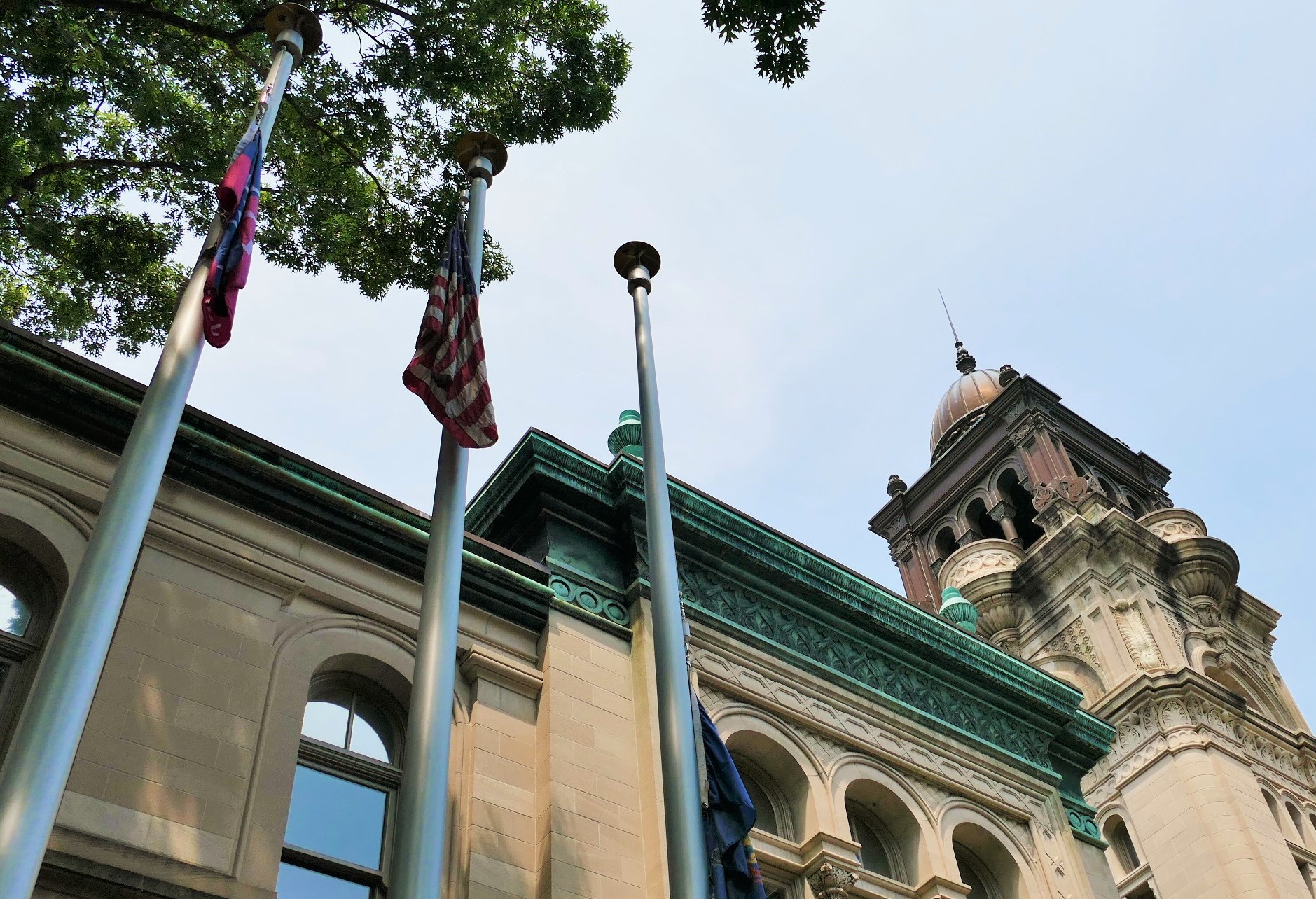 Community commemorates Juneteenth with flag-raising at City Hall ...