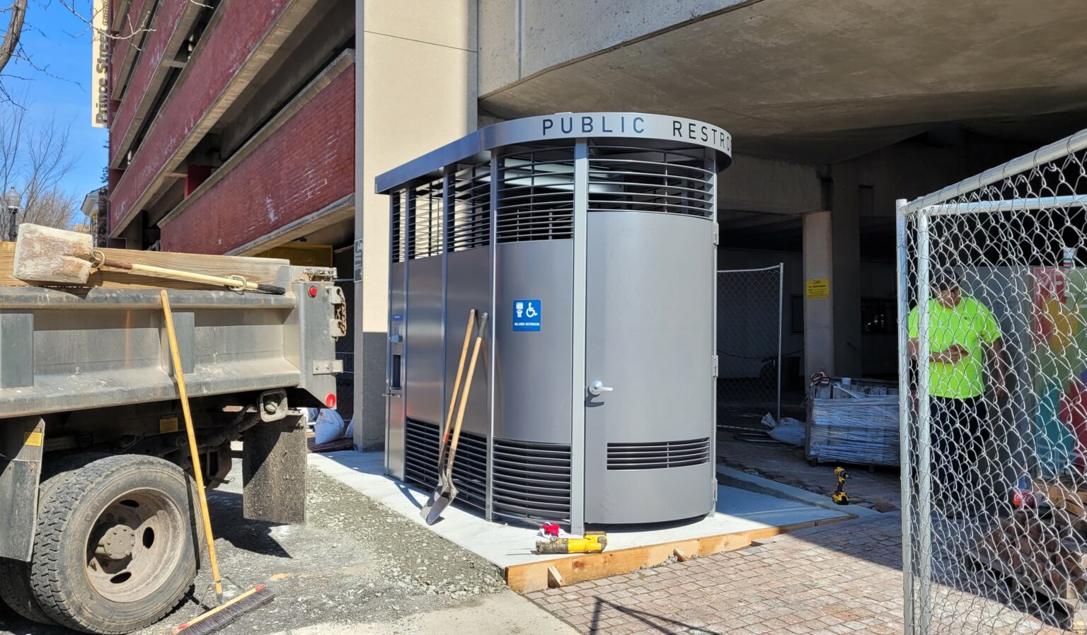 City workers installing 'Portland Loo' public toilet - One United Lancaster
